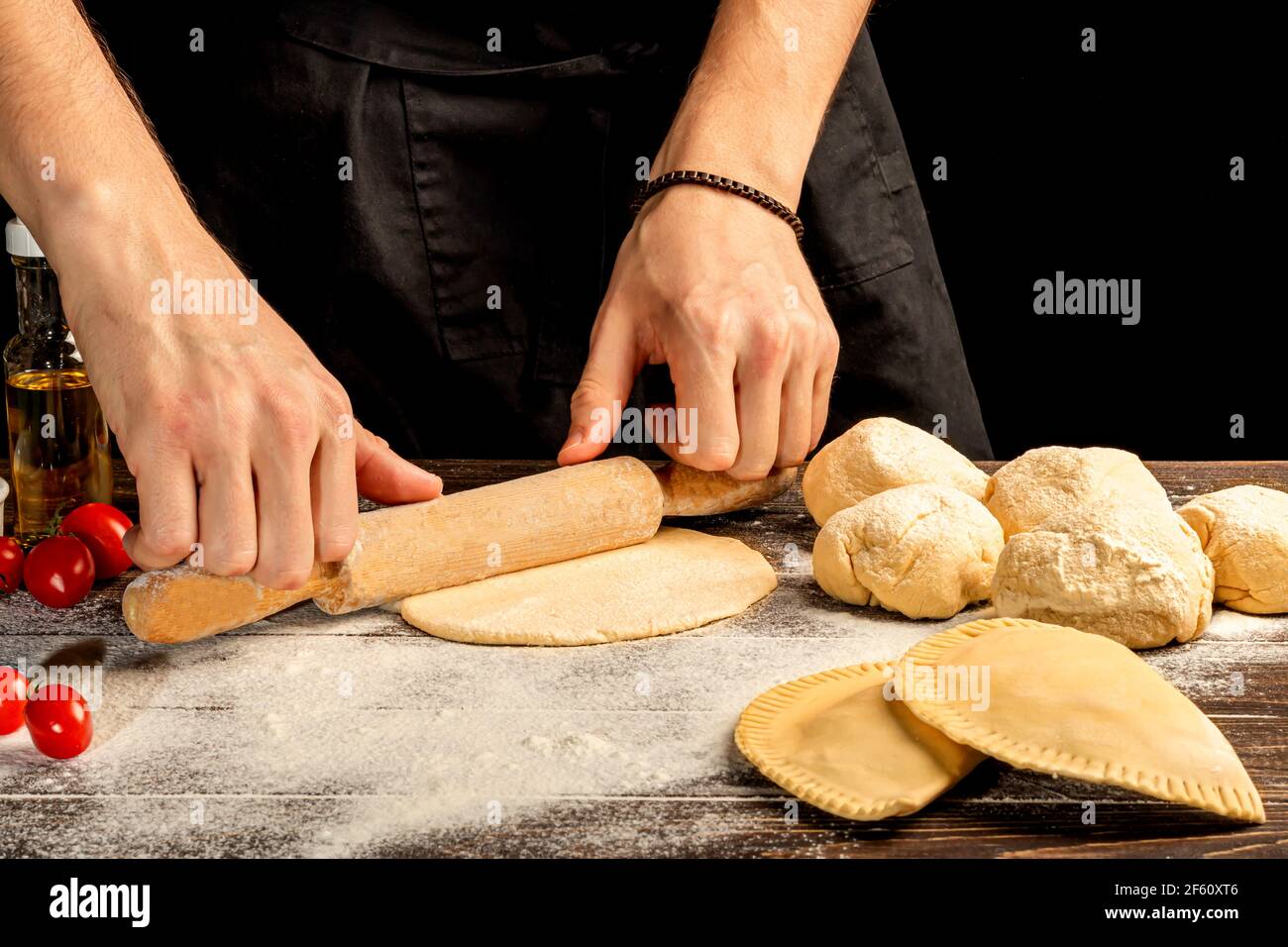 The cook prepares pasties. Step-by-step instruction. Forms the dough ...