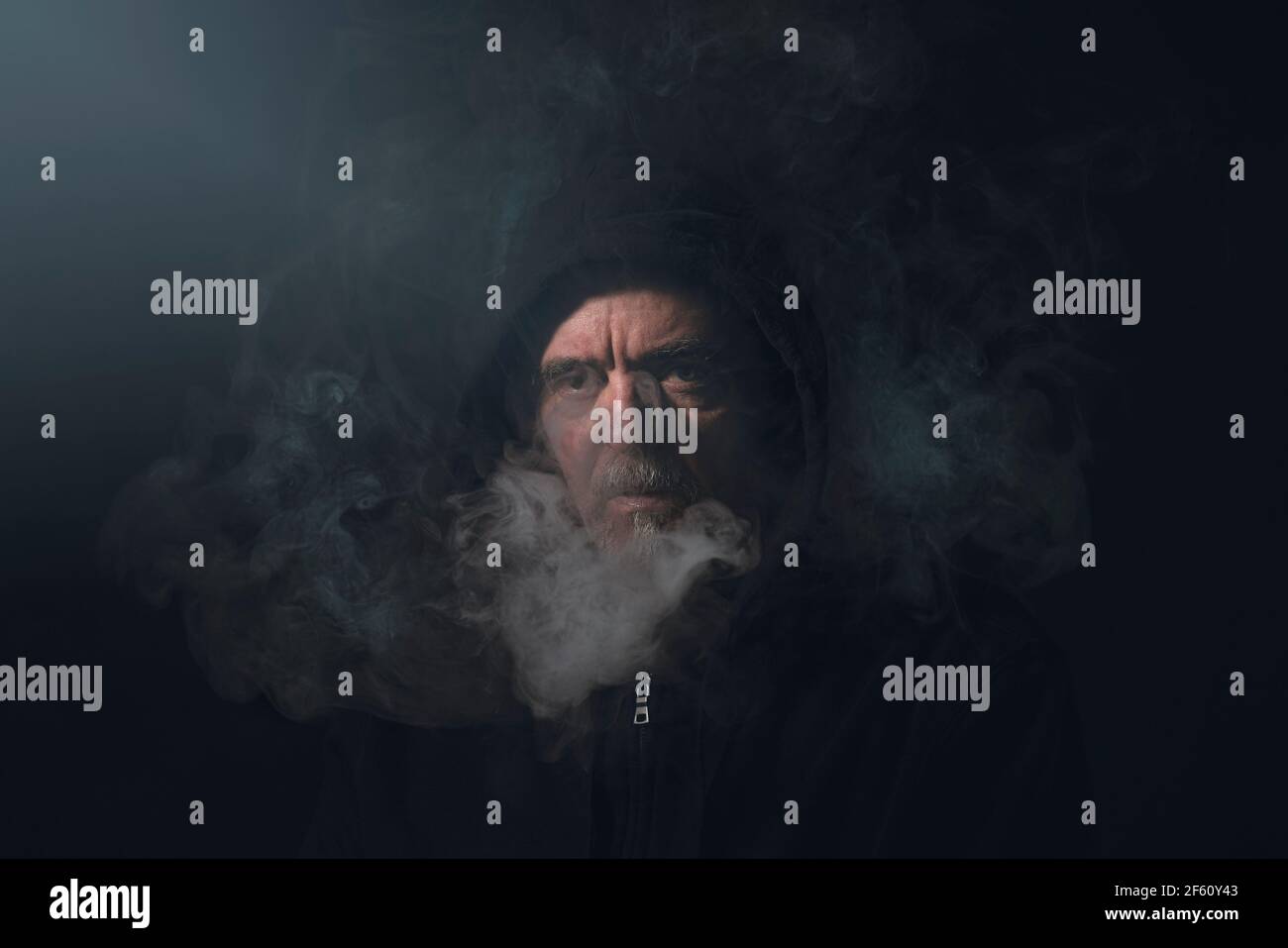 Blowing smoke in face hi-res stock photography and images - Alamy