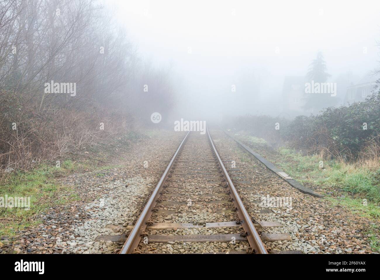 Single point perspective of single train track stretching away from ...