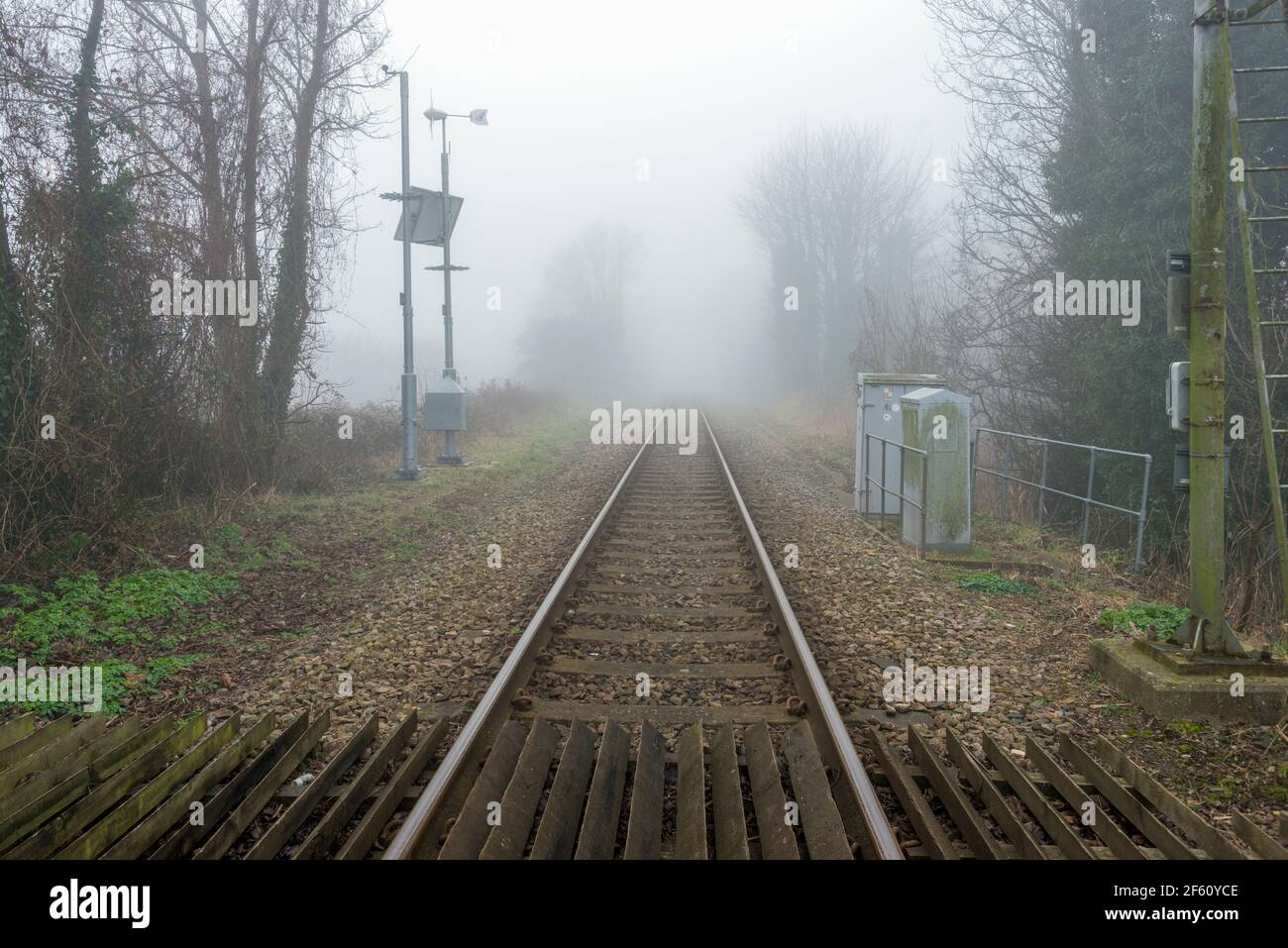 Single point perspective of single train track stretching away from ...