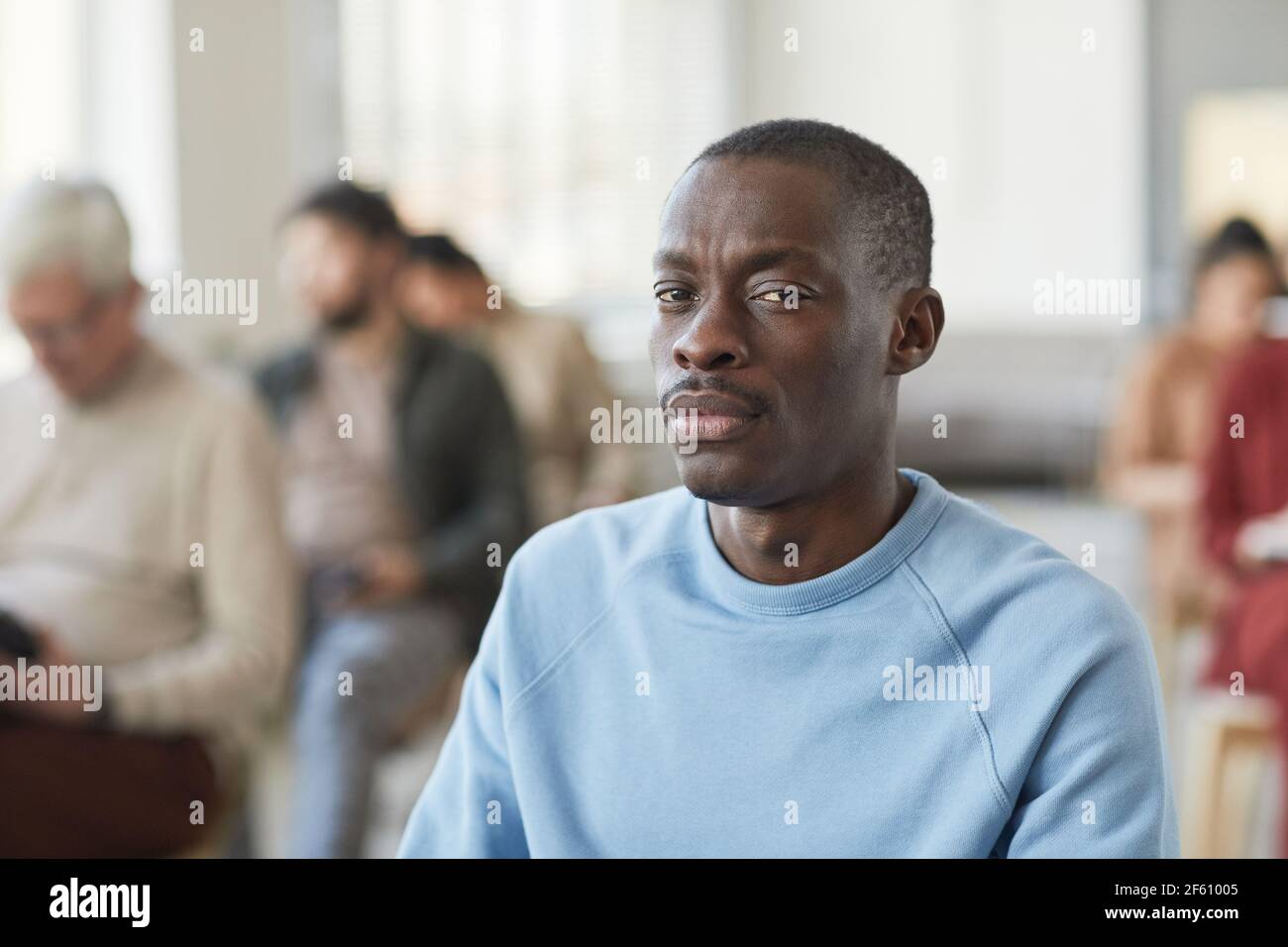 Diverse group serious people hi-res stock photography and images - Alamy