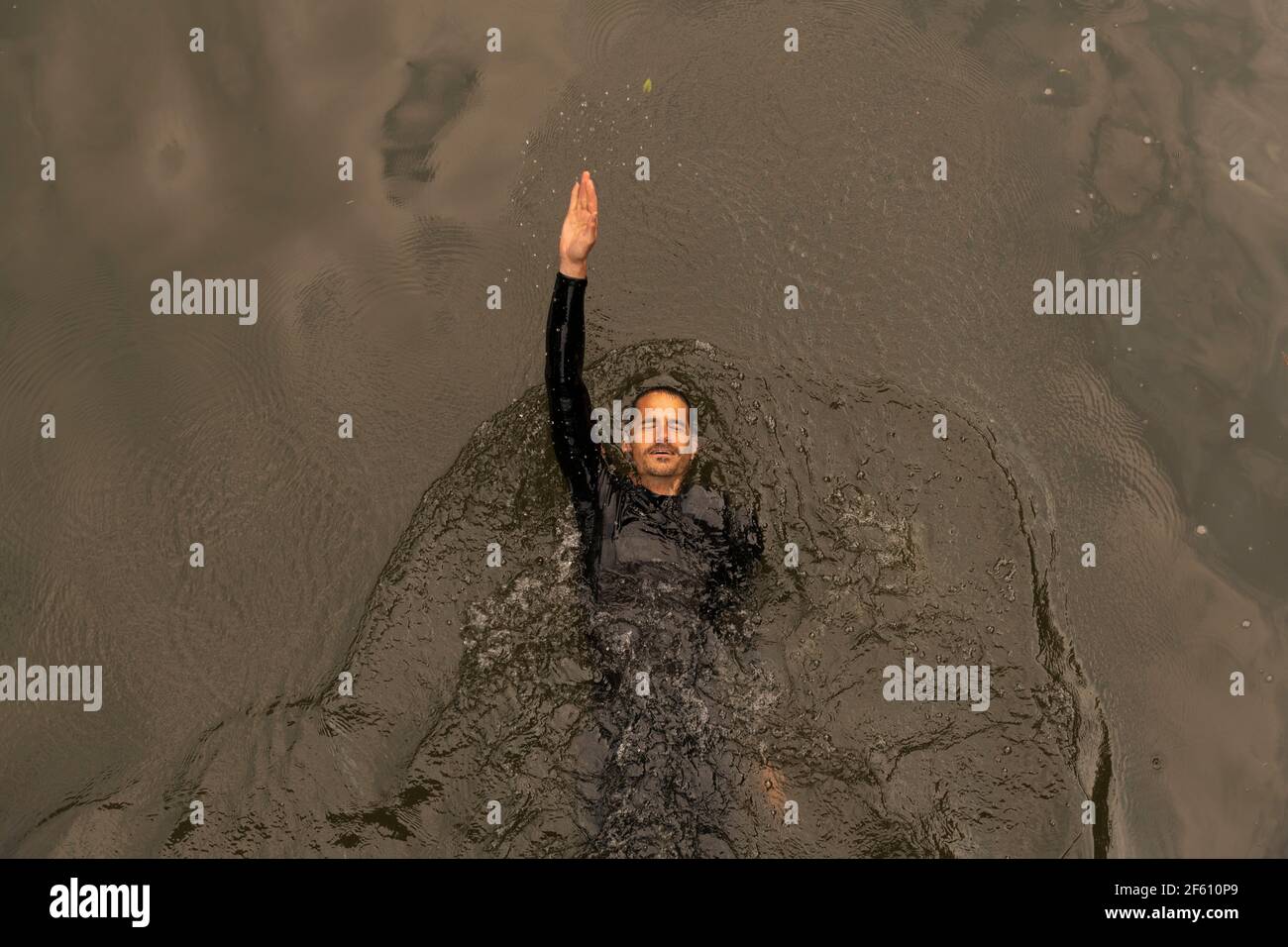Overhead view of man wild swimming in river Stock Photo - Alamy