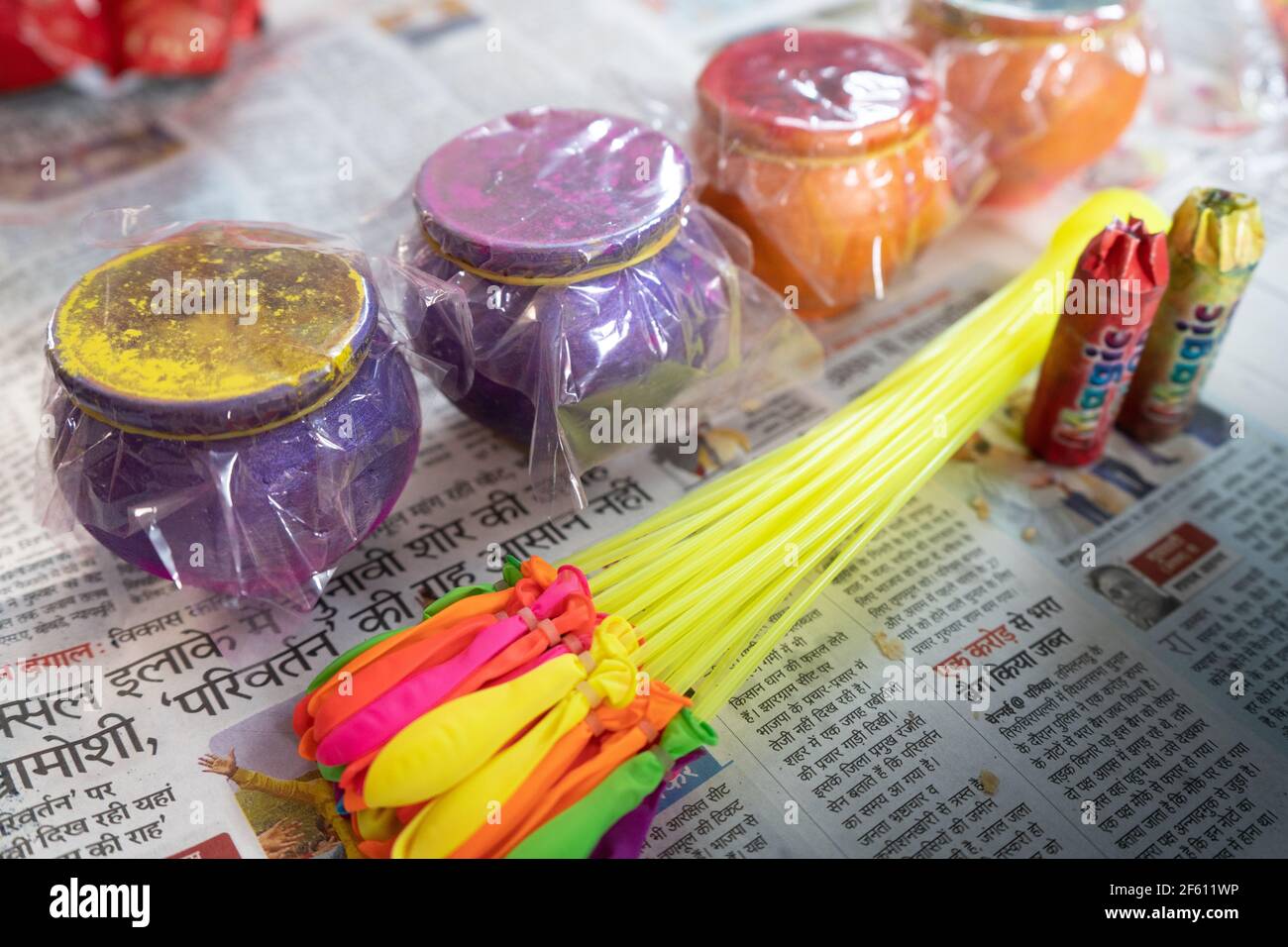 Items to celebrate holi festival like colors, water balloons ...