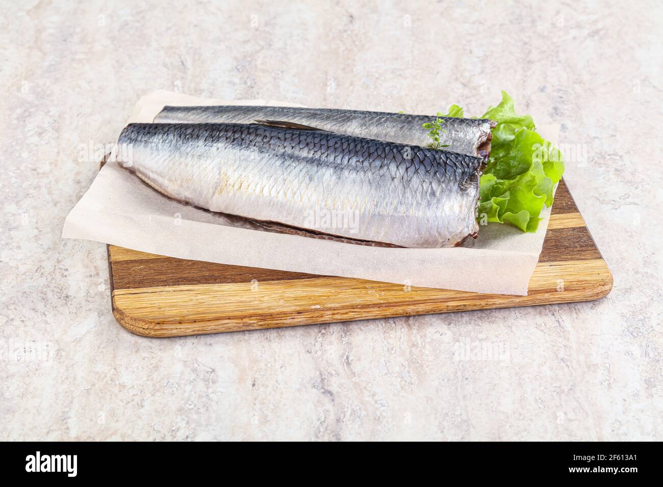 Marinated Herring fillet with skin for cooking Stock Photo - Alamy
