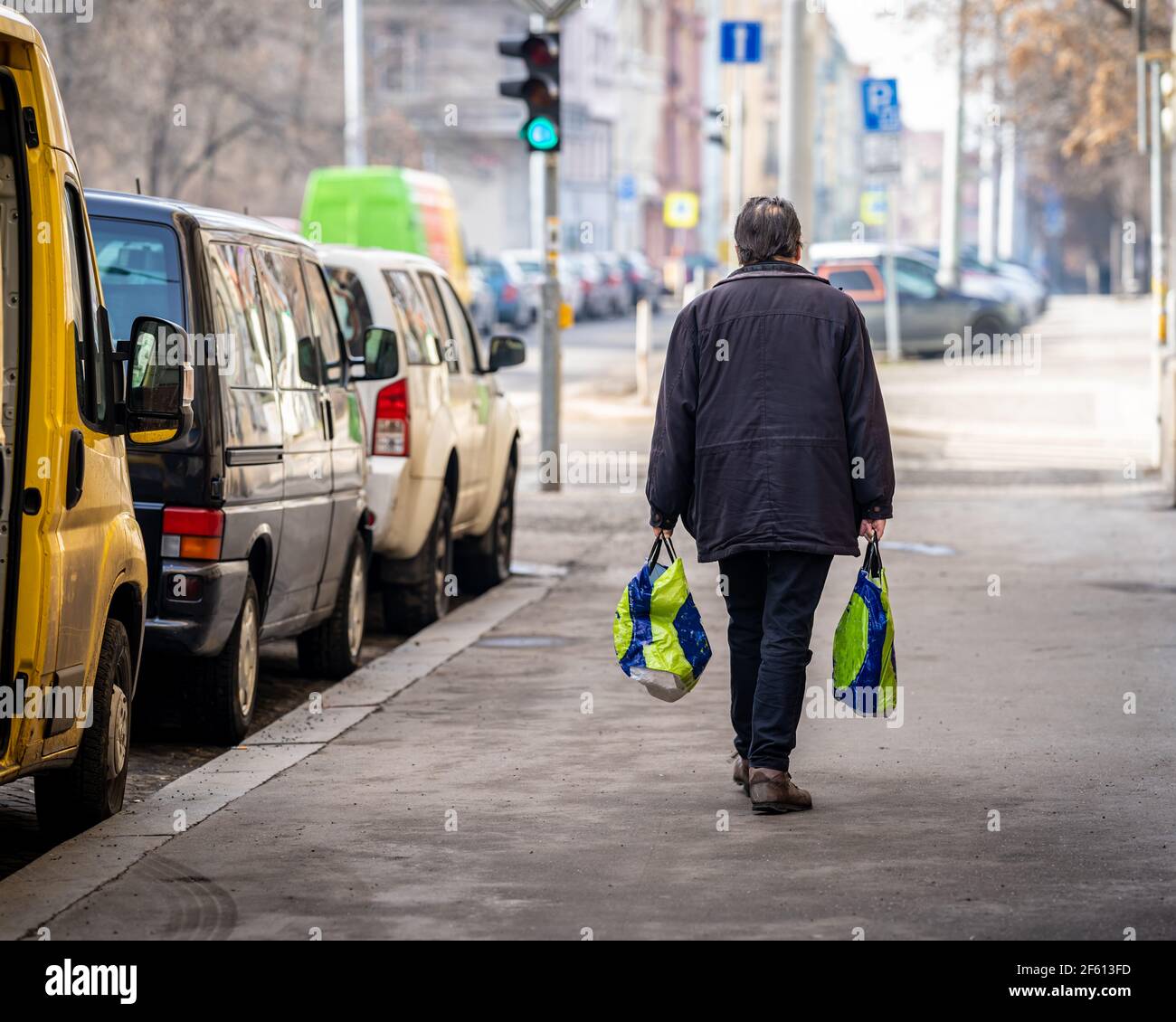 Portrait male shopper consumer walks hi-res stock photography and ...