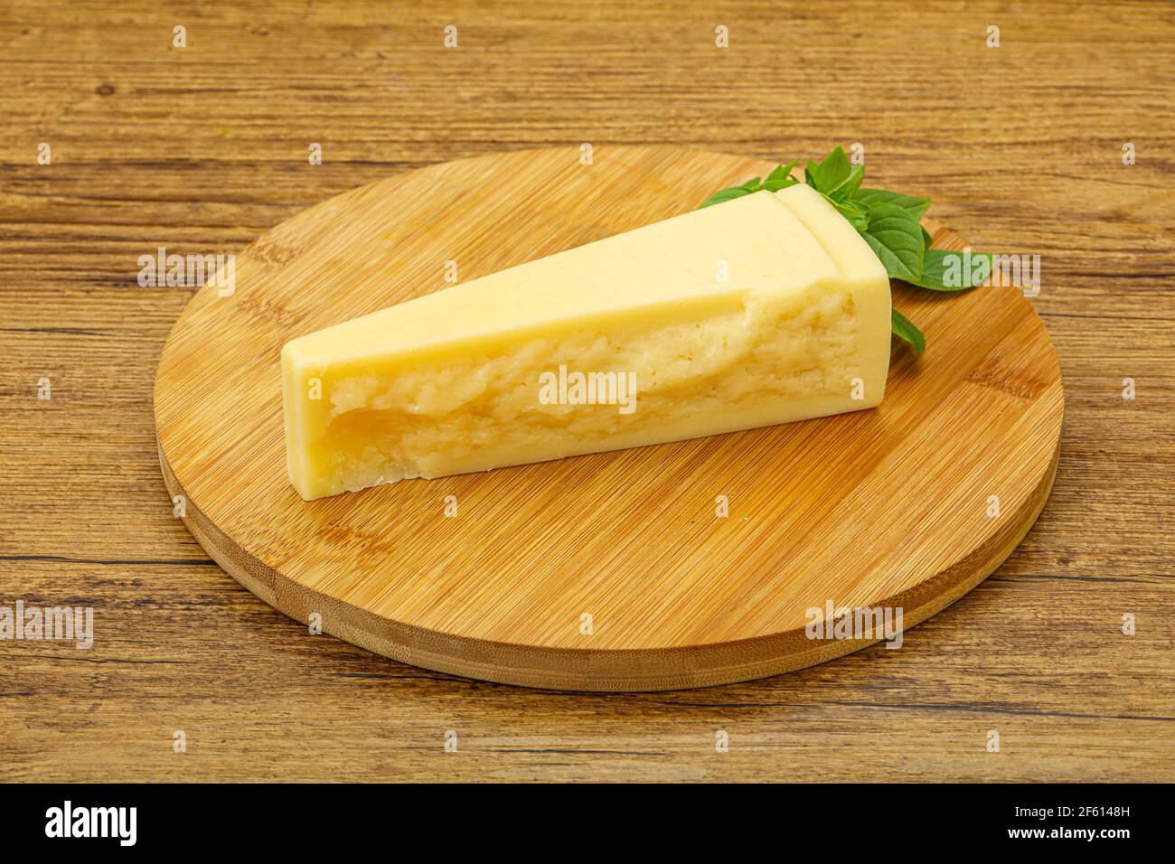 Hard parmesan cheese served basil leaves Stock Photo - Alamy