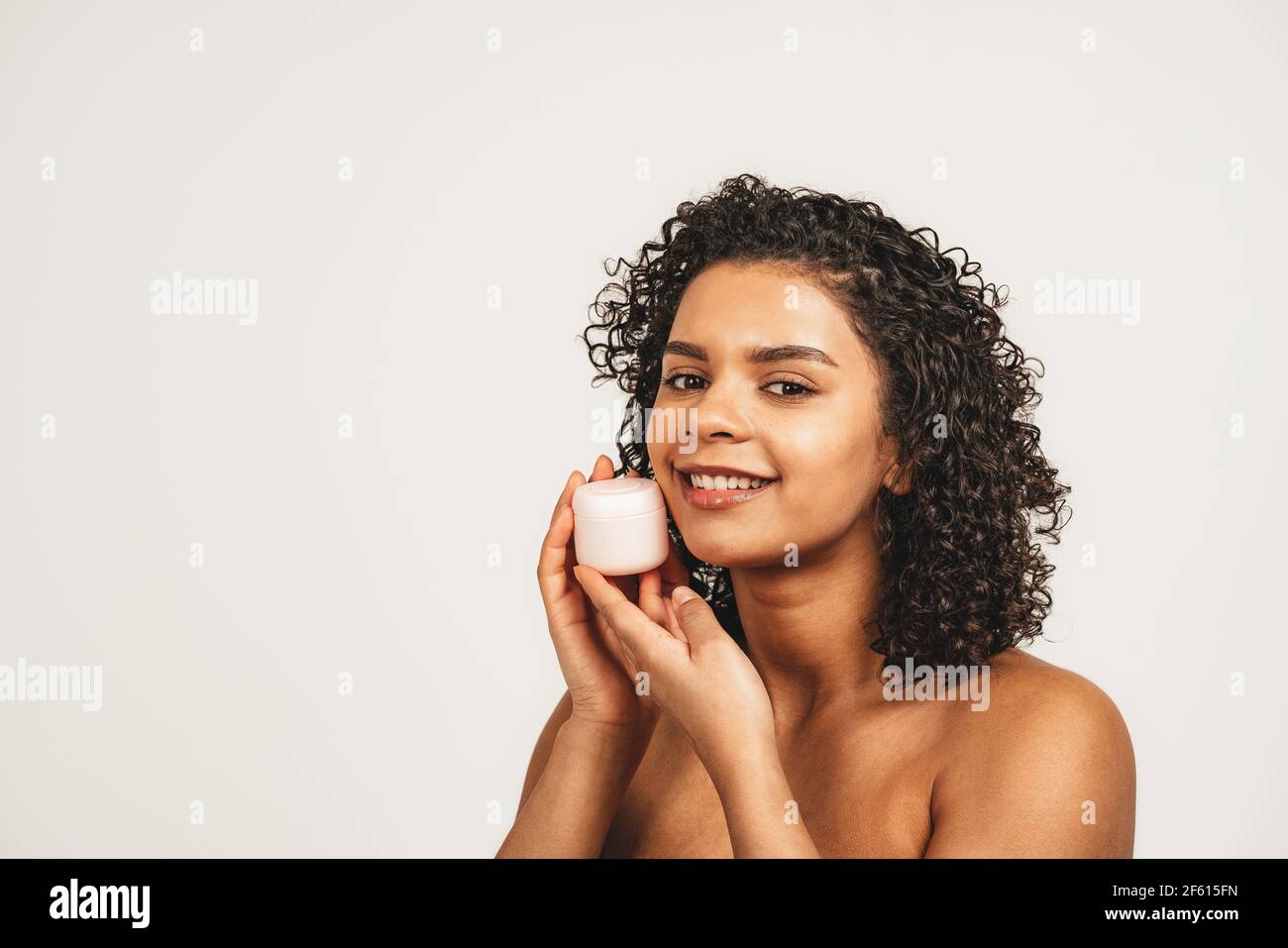 Close up photo of face natural beauty attractive black woman holds ...