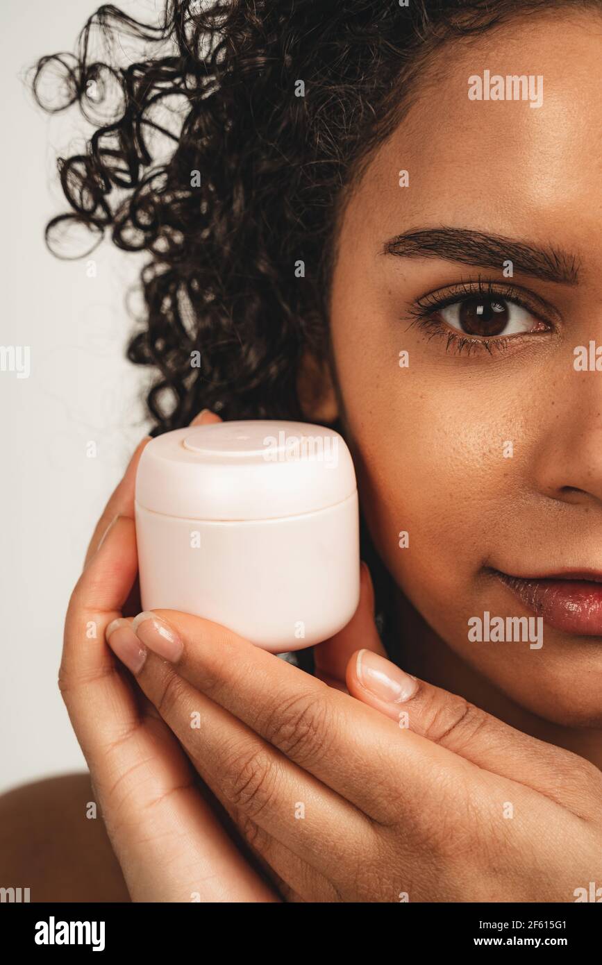 Close up photo of face natural beauty attractive black woman holds ...