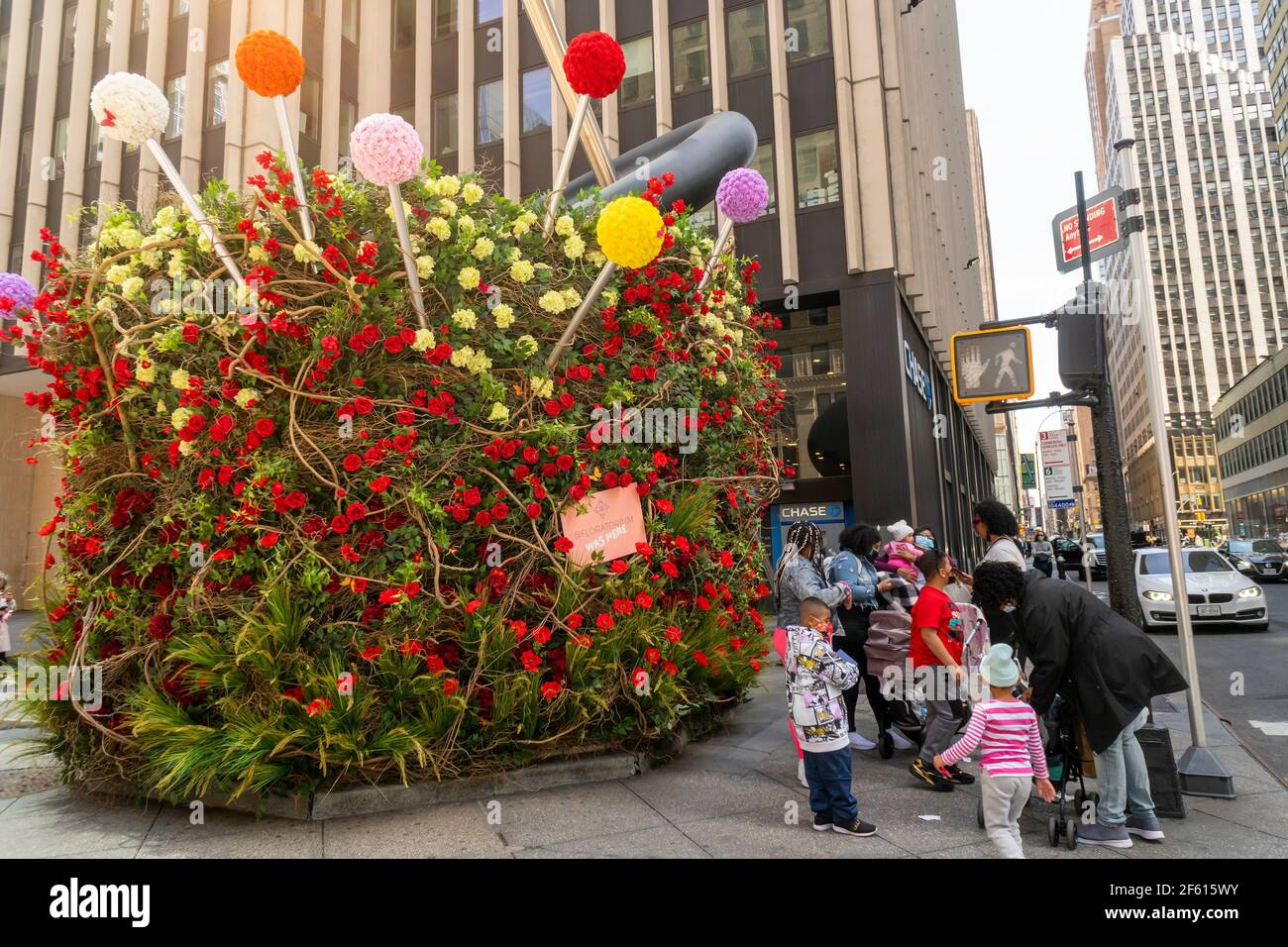 Visitors to the Garment District in New York interact with the floral ...
