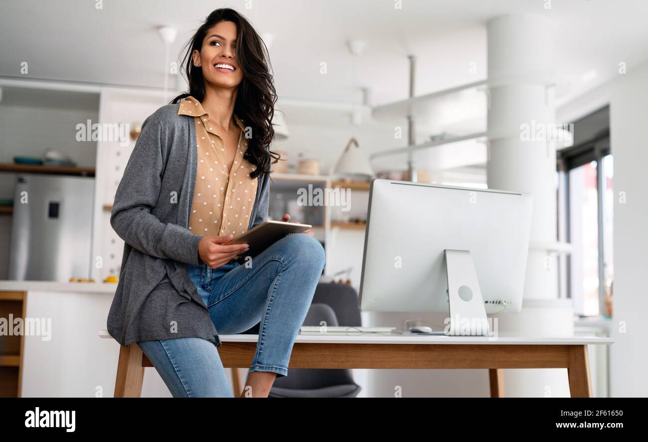 Attractive business woman working on computer. Business technology ...