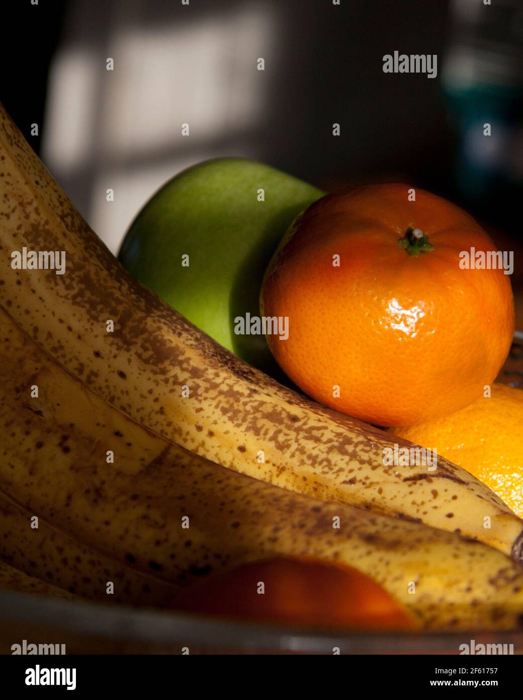 Fresh Ripe Fruit low key Still Life on kitchen Counter with banana ...