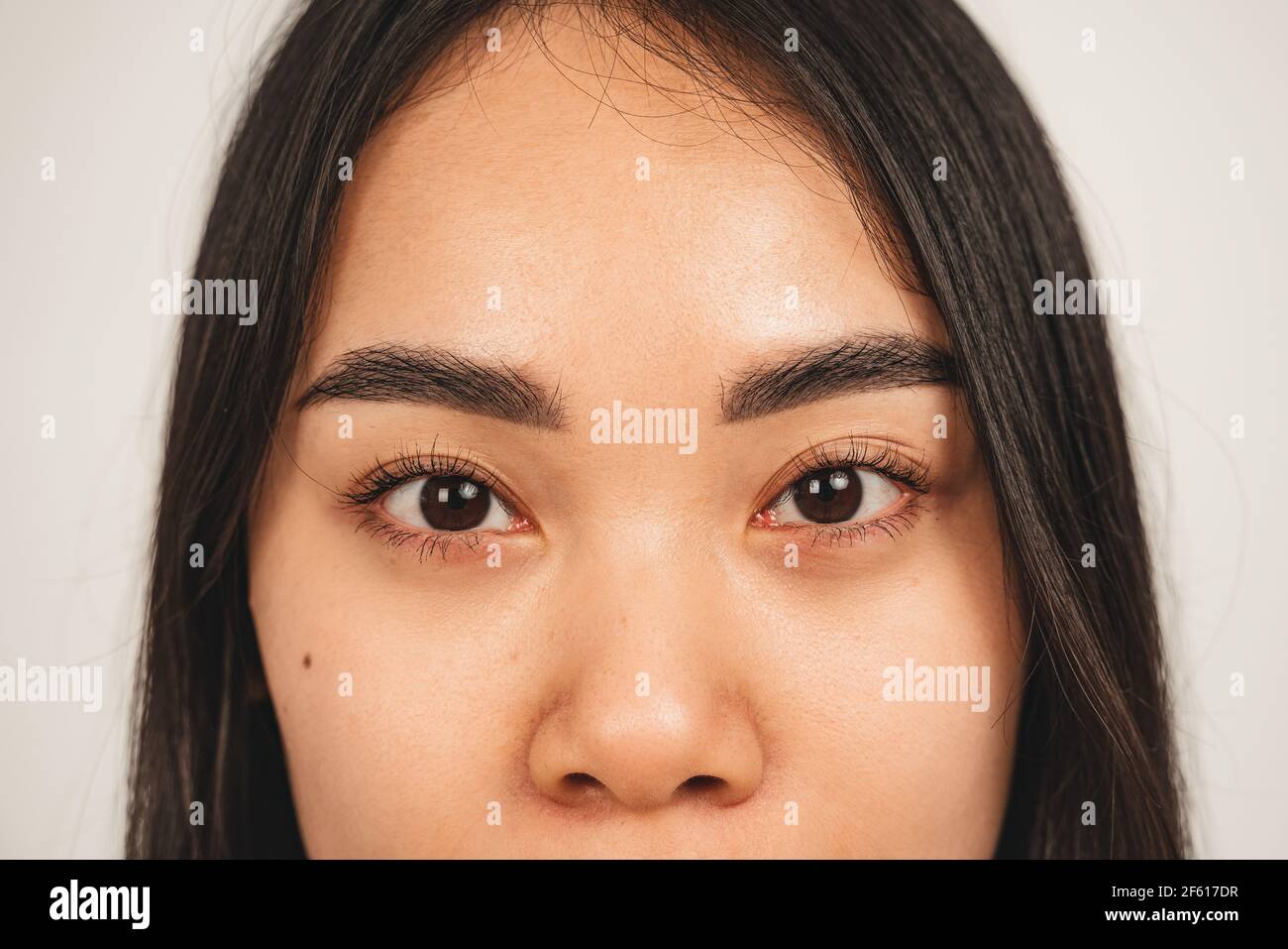 Close up photo of natural woman face. Isolated over white background ...