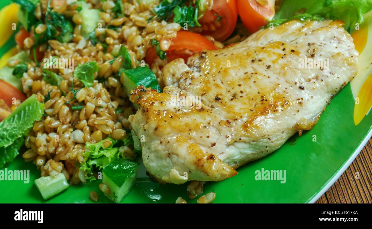 Cajun Grilled Chicken with Spelt, Pear and Watercress Salad Stock Photo ...