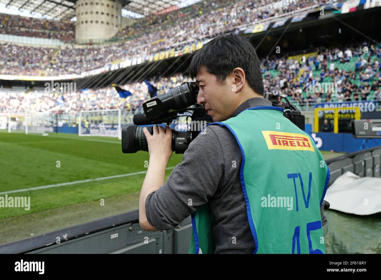Tv cameraman at work at the San Siro football stadium, in Milan, in ...