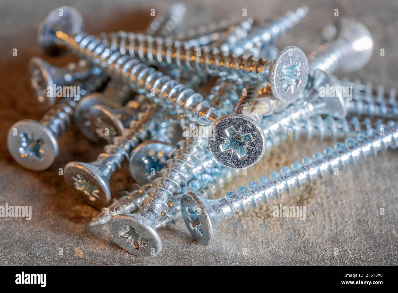 Macro close up screws placed on the table Stock Photo - Alamy