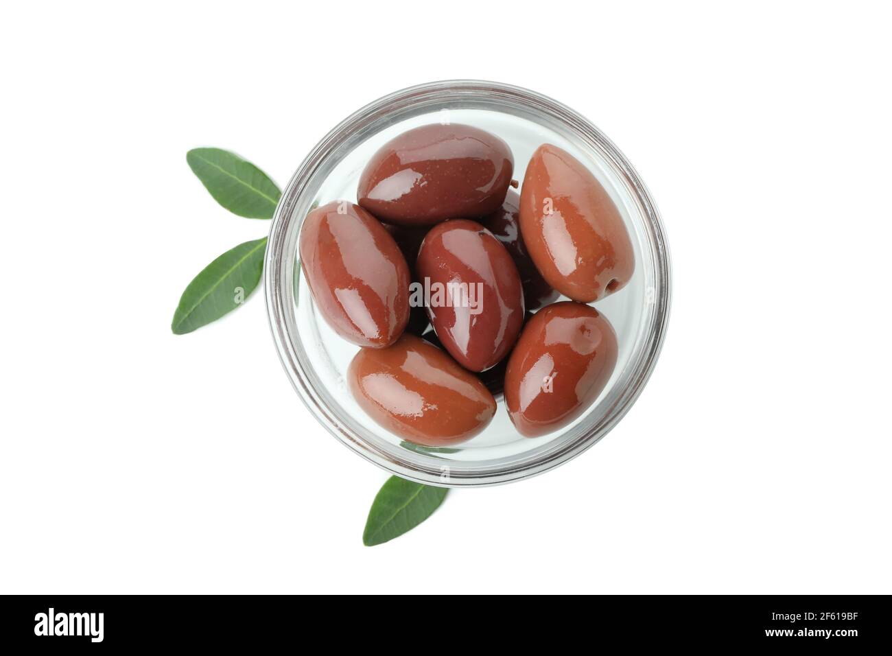 Bowl of red olives isolated on white background Stock Photo - Alamy