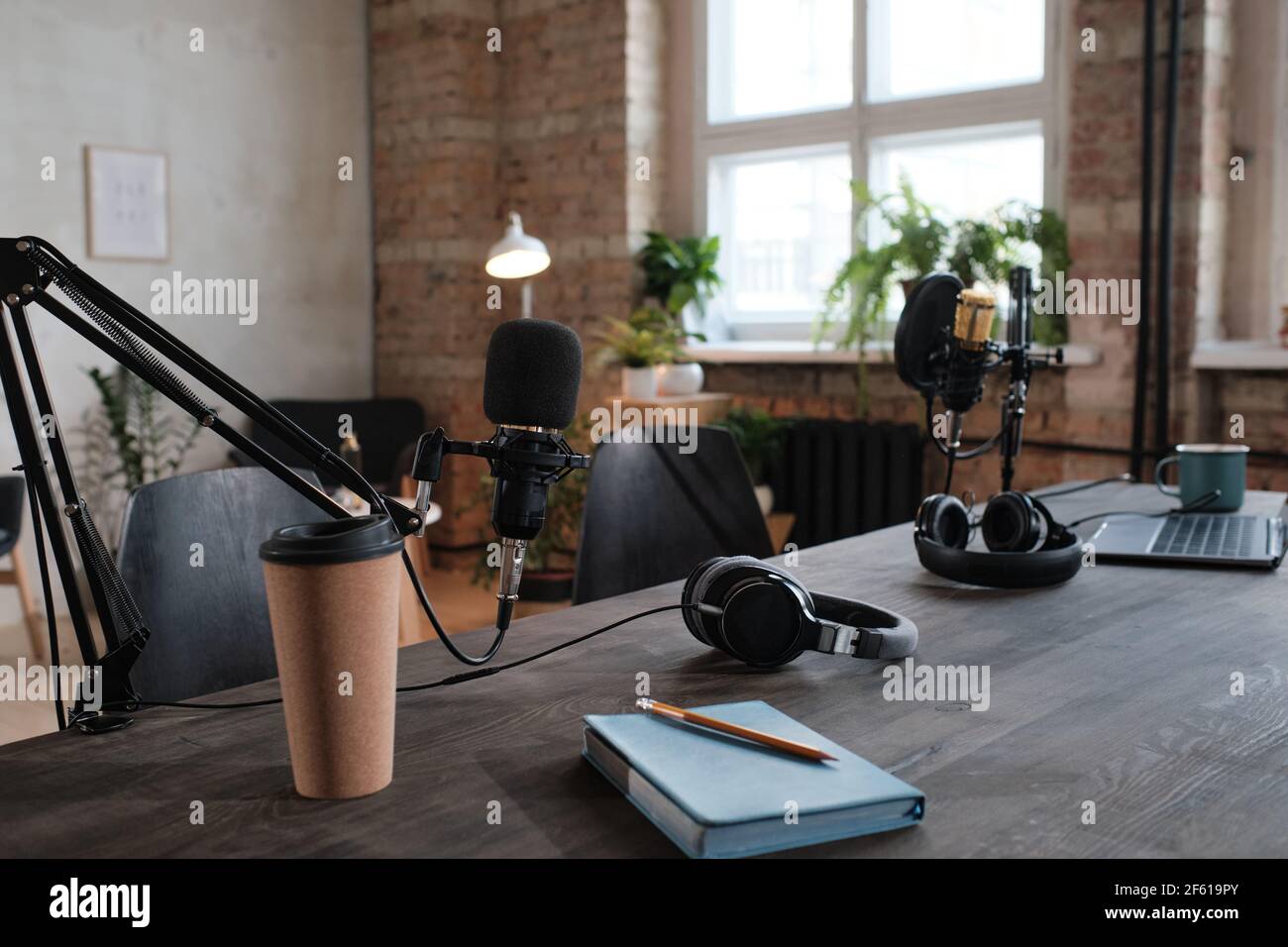 Image of modern recording studio with table with laptop and microphone ...