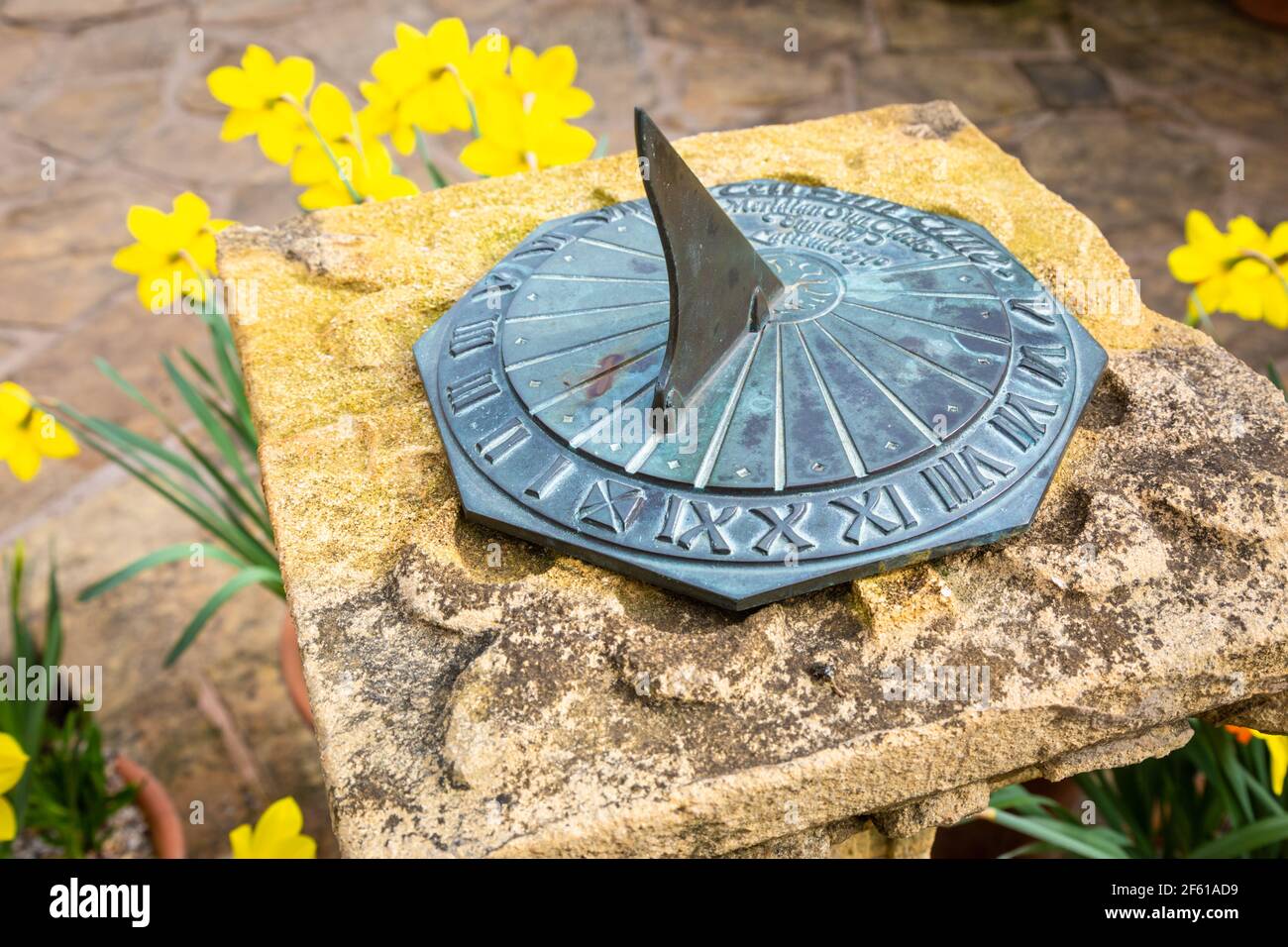 Sundial on stone pillar Stock Photo - Alamy