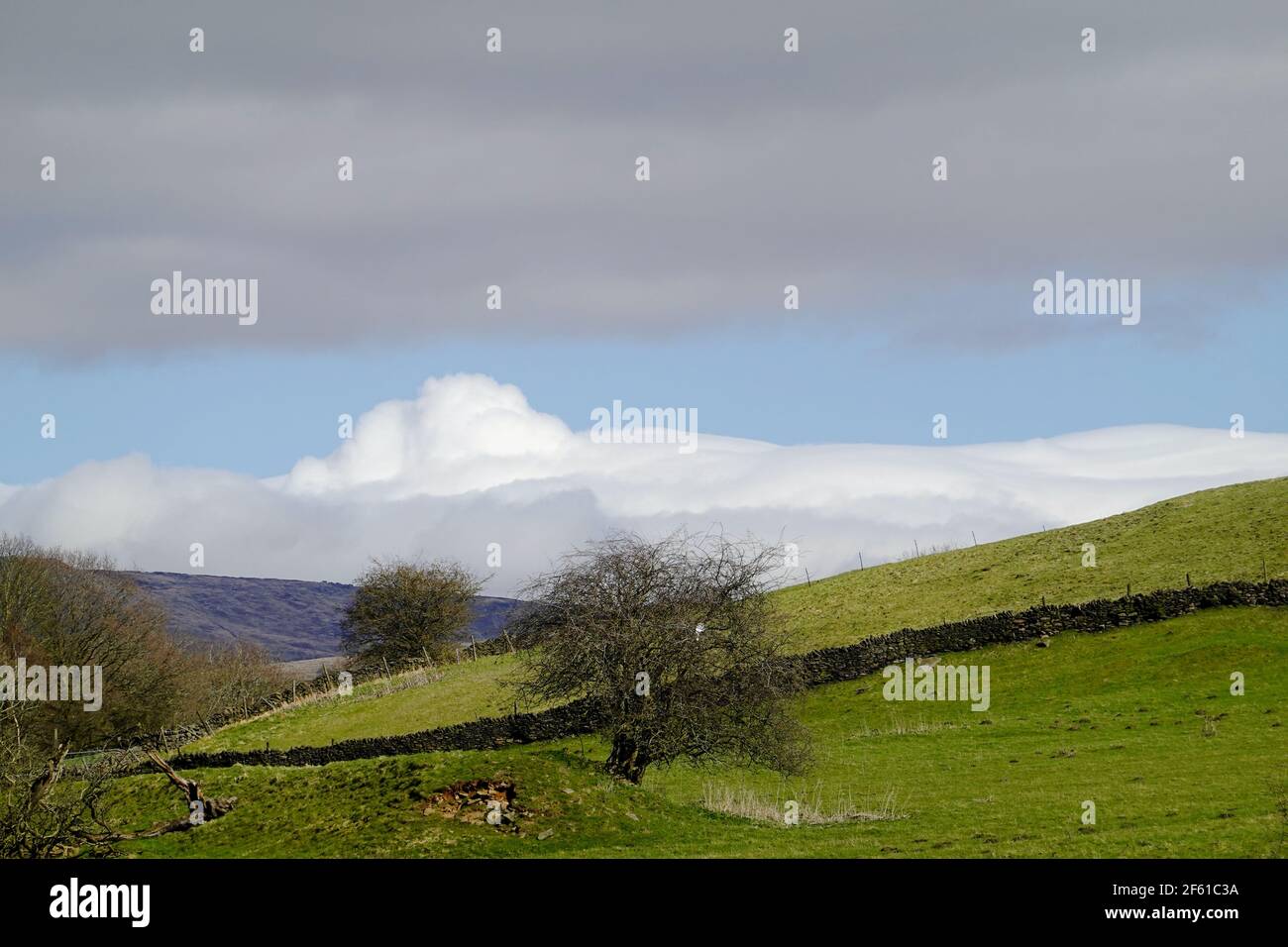 Thick white cloud over Kinder Scout, seen from New Mills, Derbyshire ...