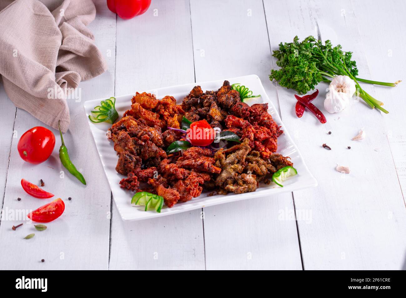 Chicken pakoda or pakora,three different flavours of pakora arranged in ...