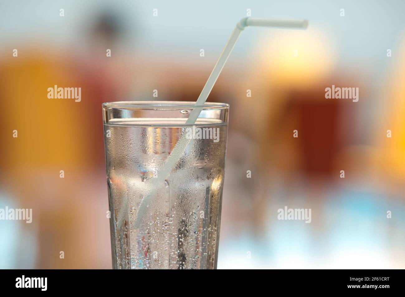 A glass of cool mineral sparkling water is on the table in the summer cafe Stock Photo - Alamy