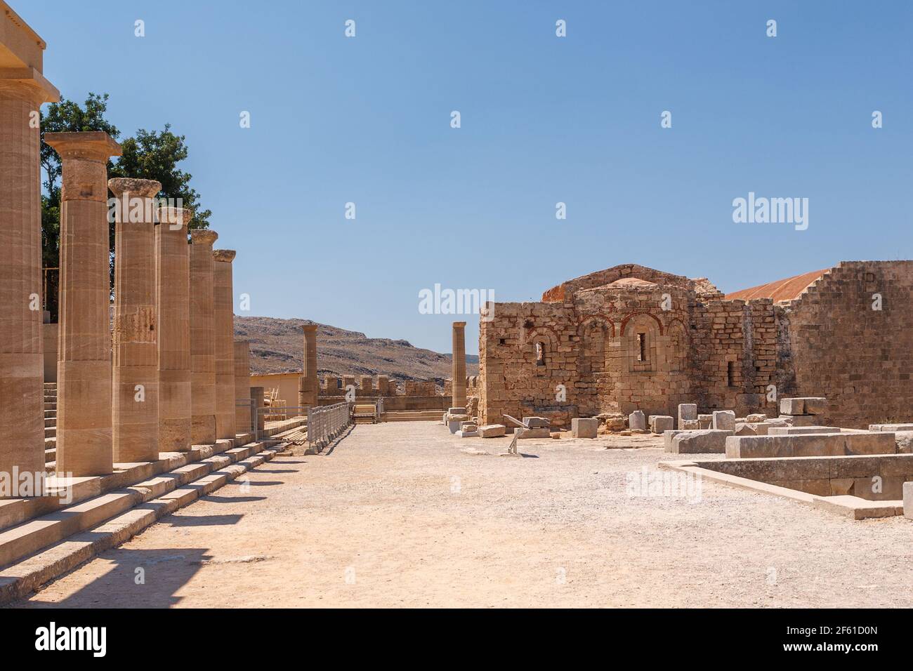 Destroyed ancient columns of the ancient city of Lindos, Rhodes, Greece ...