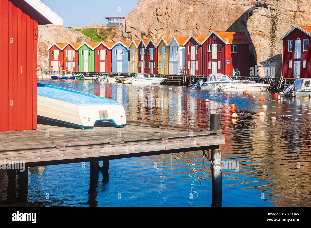 Colorful fish cottages at harbor Stock Photo - Alamy