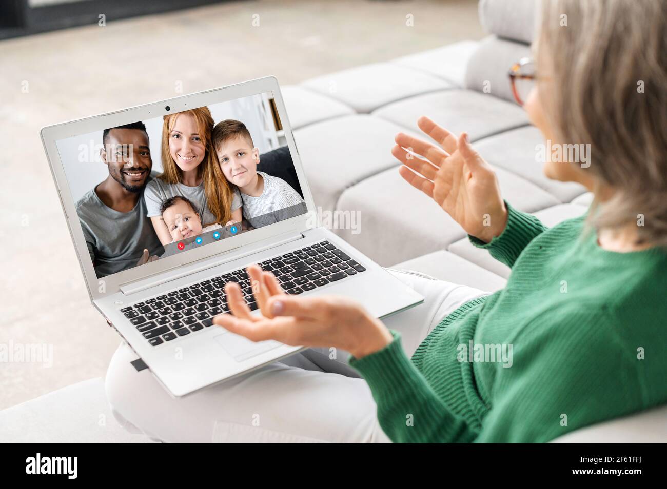 Mature woman video call grandchild hi-res stock photography and images ...