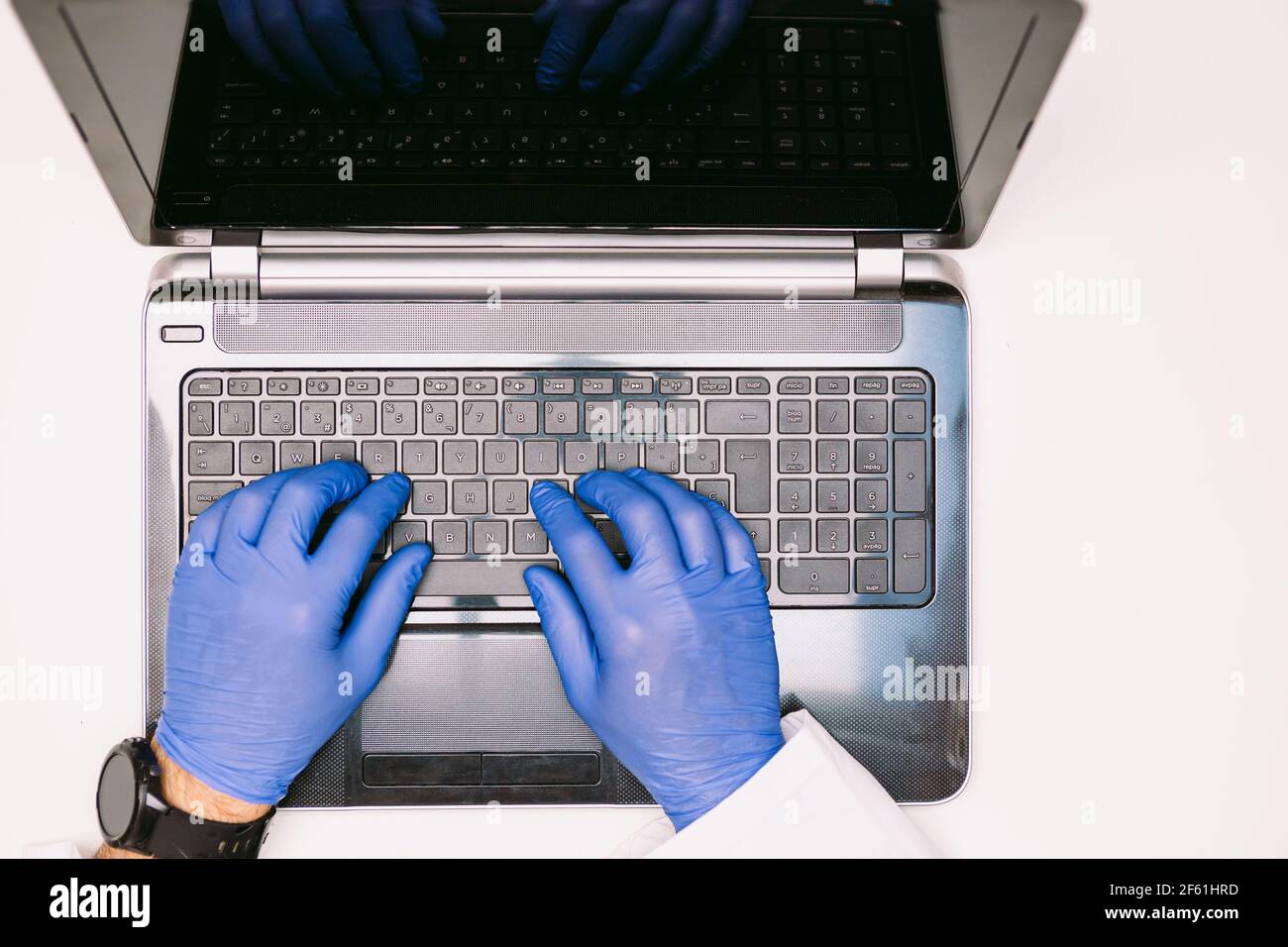 Computer keyboard hands gloves hi-res stock photography and images - Alamy