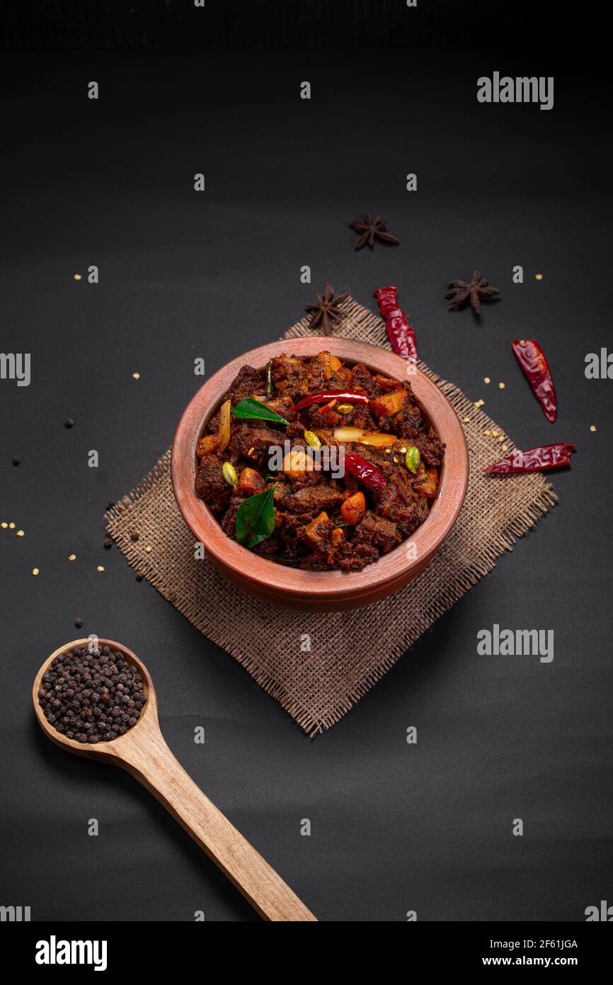 Beef roast or pothu ulartheyadu, kerala special dish arranged in an ...