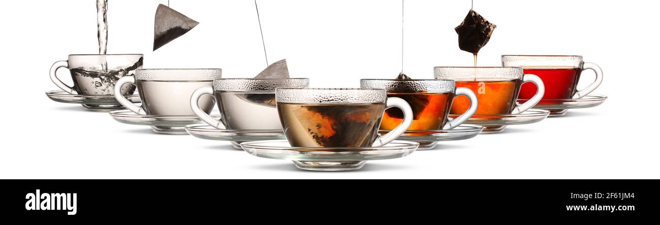 Process of making tea in glass cup on white background Stock Photo - Alamy