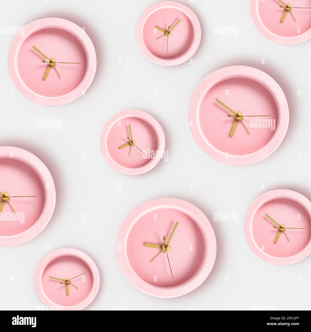 Many alarm clocks on white background Stock Photo - Alamy