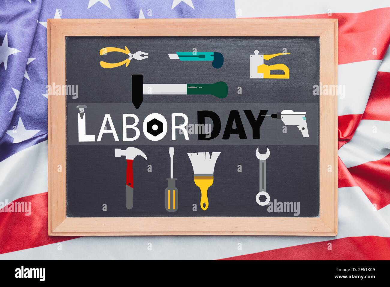 Chalkboard with text HAPPY LABOR DAY on USA flag Stock Photo - Alamy