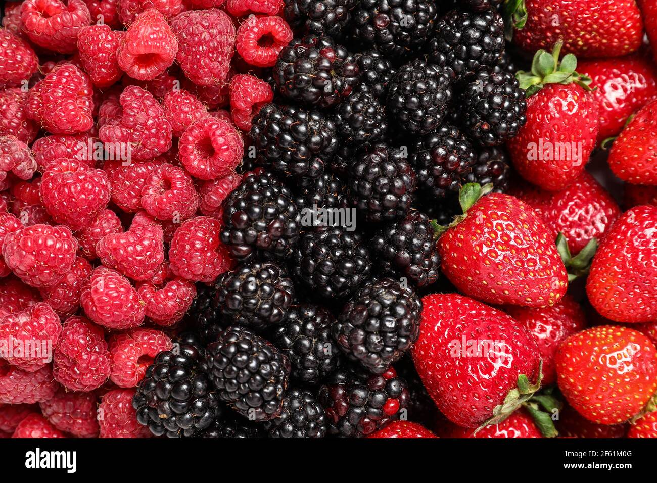 Different fresh berries as background Stock Photo - Alamy