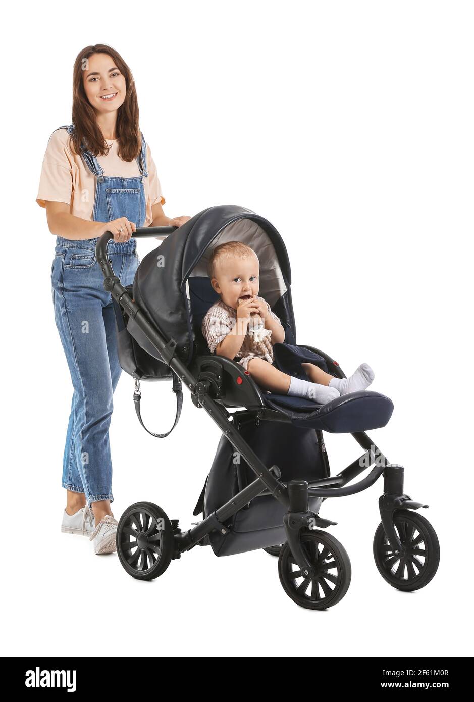 Woman and her cute baby in stroller on white background Stock Photo - Alamy