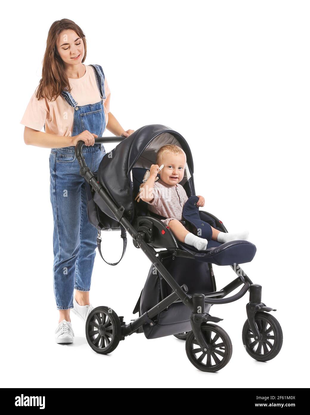 Woman and her cute baby in stroller on white background Stock Photo - Alamy
