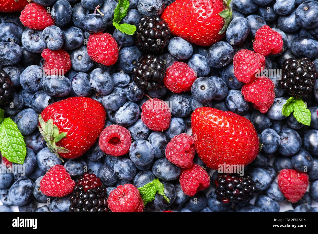 Different fresh berries as background Stock Photo - Alamy