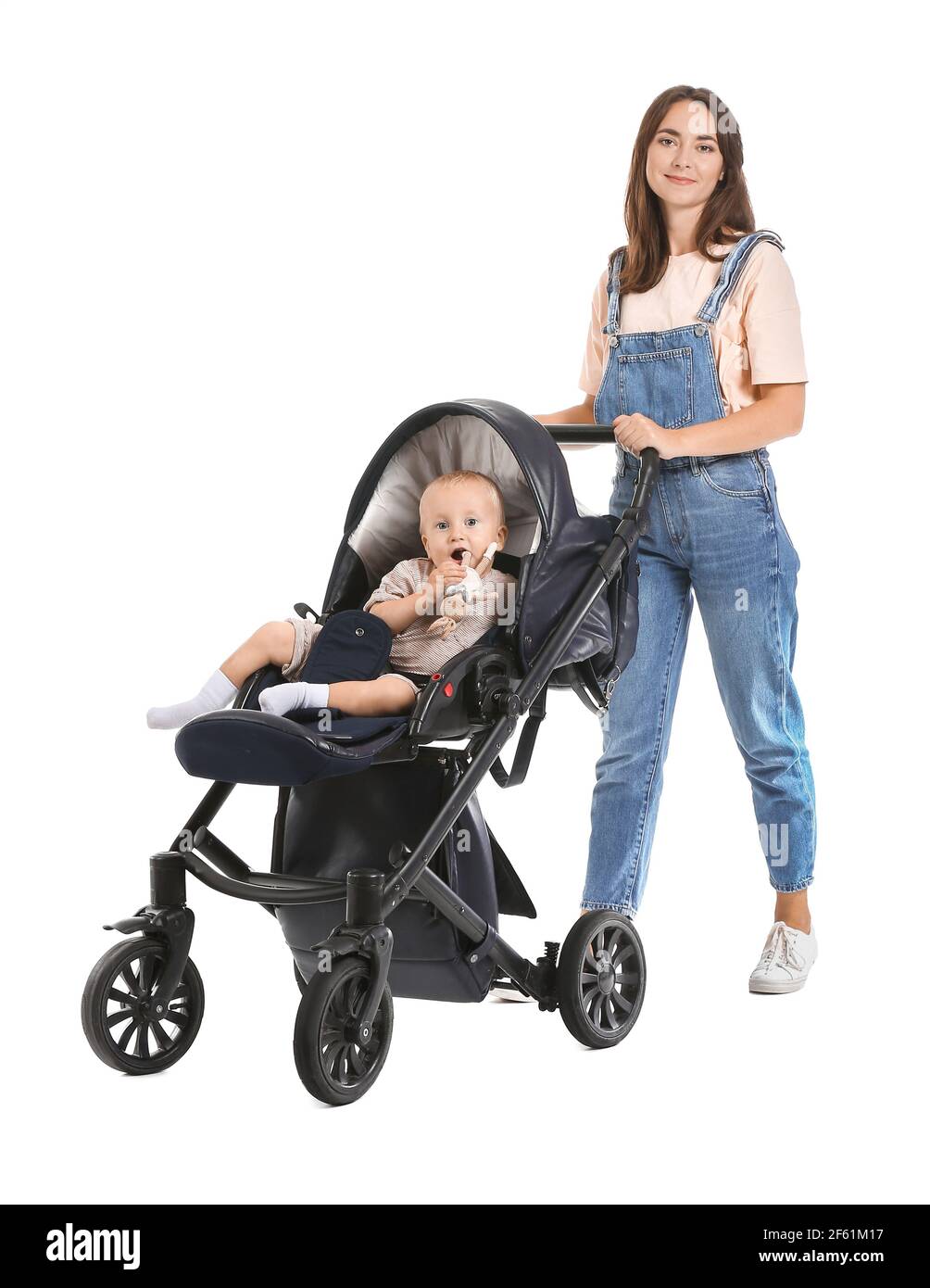 Woman and her cute baby in stroller on white background Stock Photo - Alamy