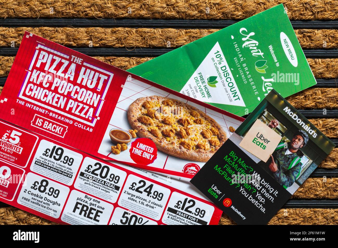 assortment of Junk mail post unsolicited mail for fast food offers ...