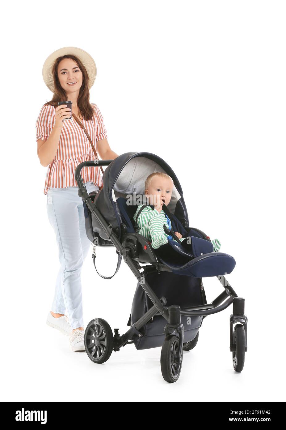 Woman and her cute baby in stroller on white background Stock Photo - Alamy
