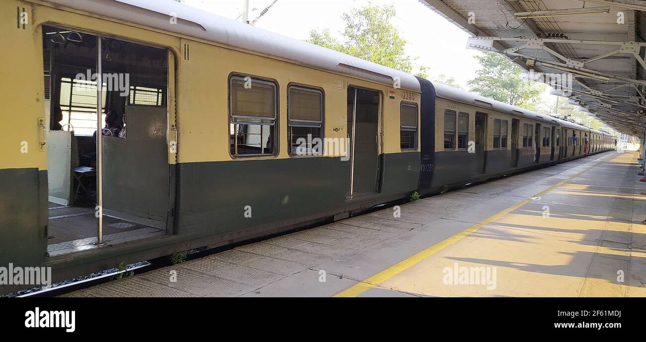 Suburban local train on the fort railway station. City metro vendors ...