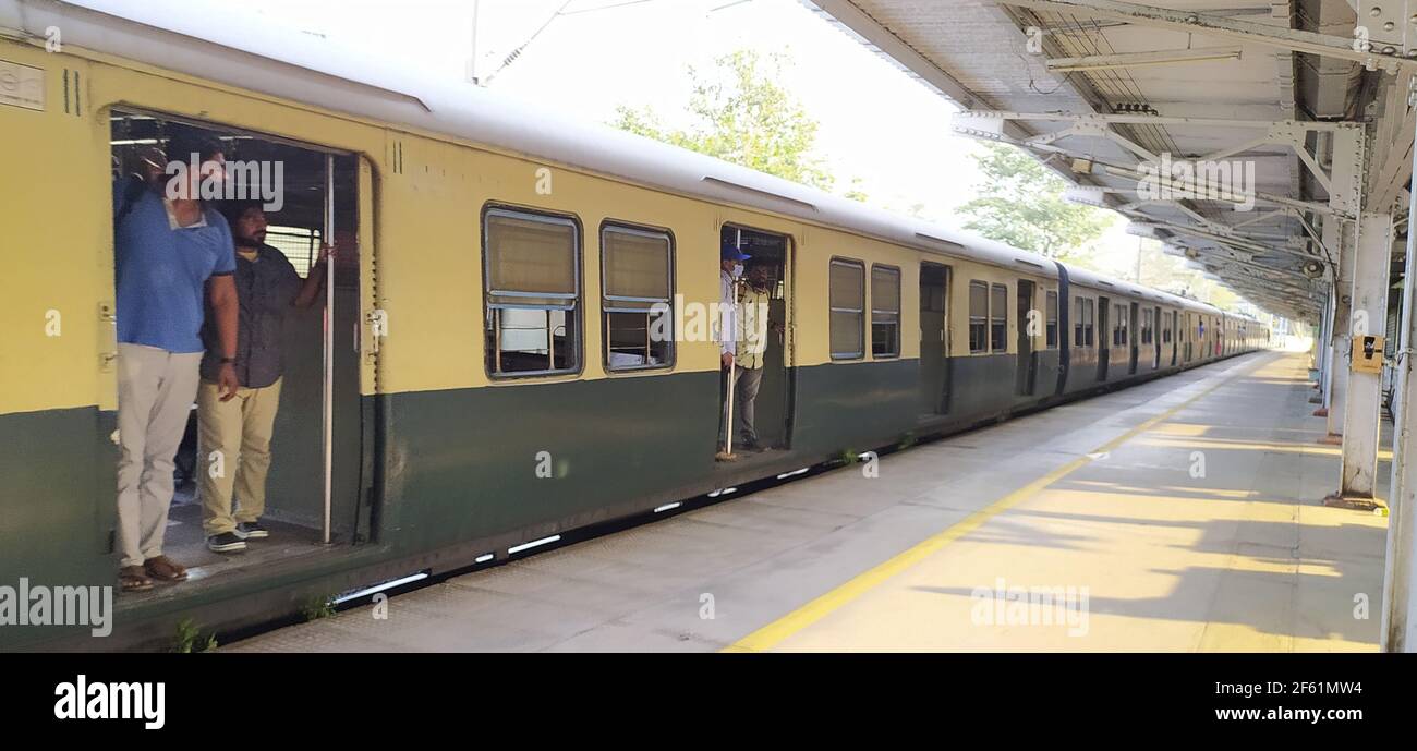 Suburban local train on the fort railway station. City metro vendors ...