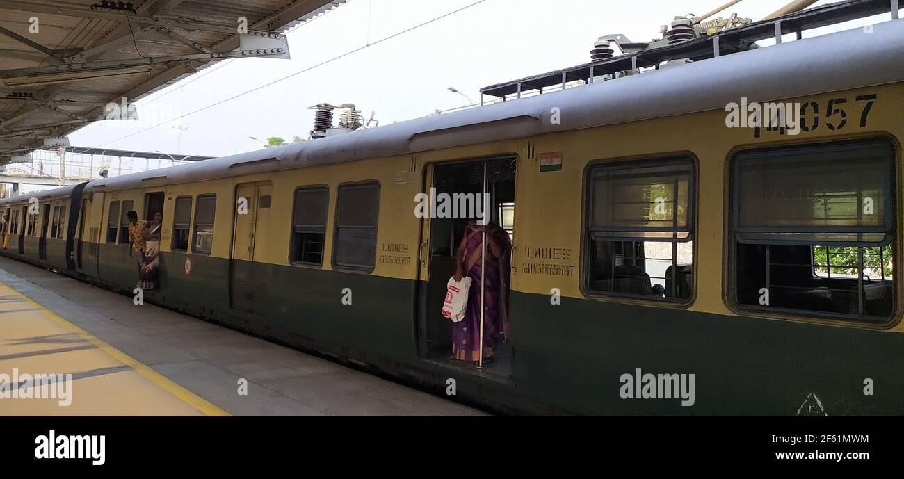 Suburban local train on the fort railway station. City metro vendors ...