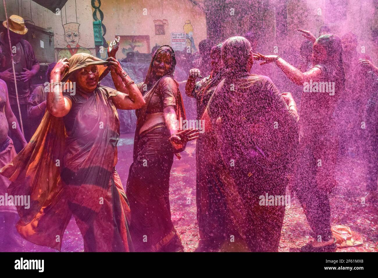 People play with colourful powders during the festival. Holi is a ...