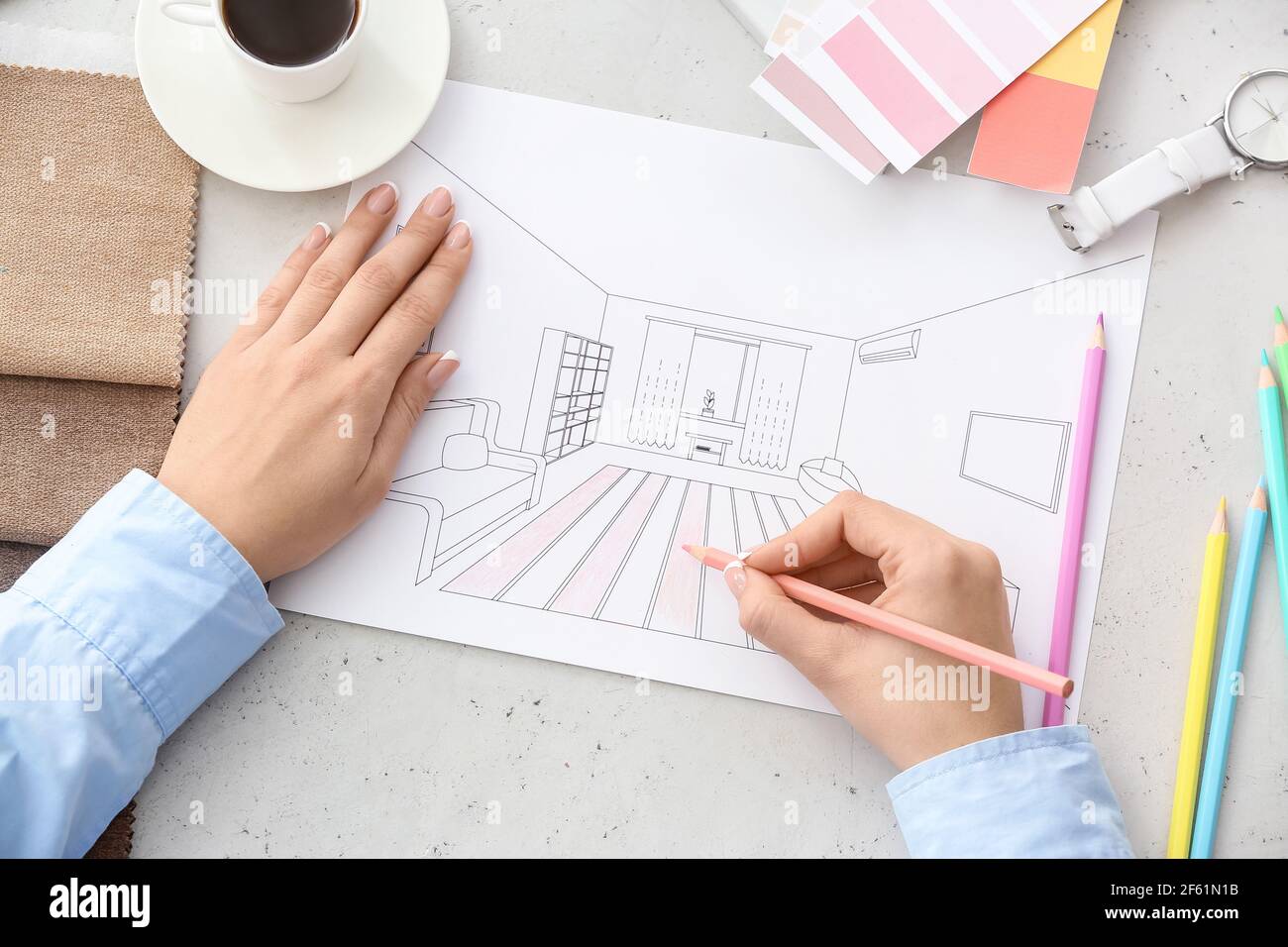 Female interior designer drawing house plan in office Stock Photo - Alamy