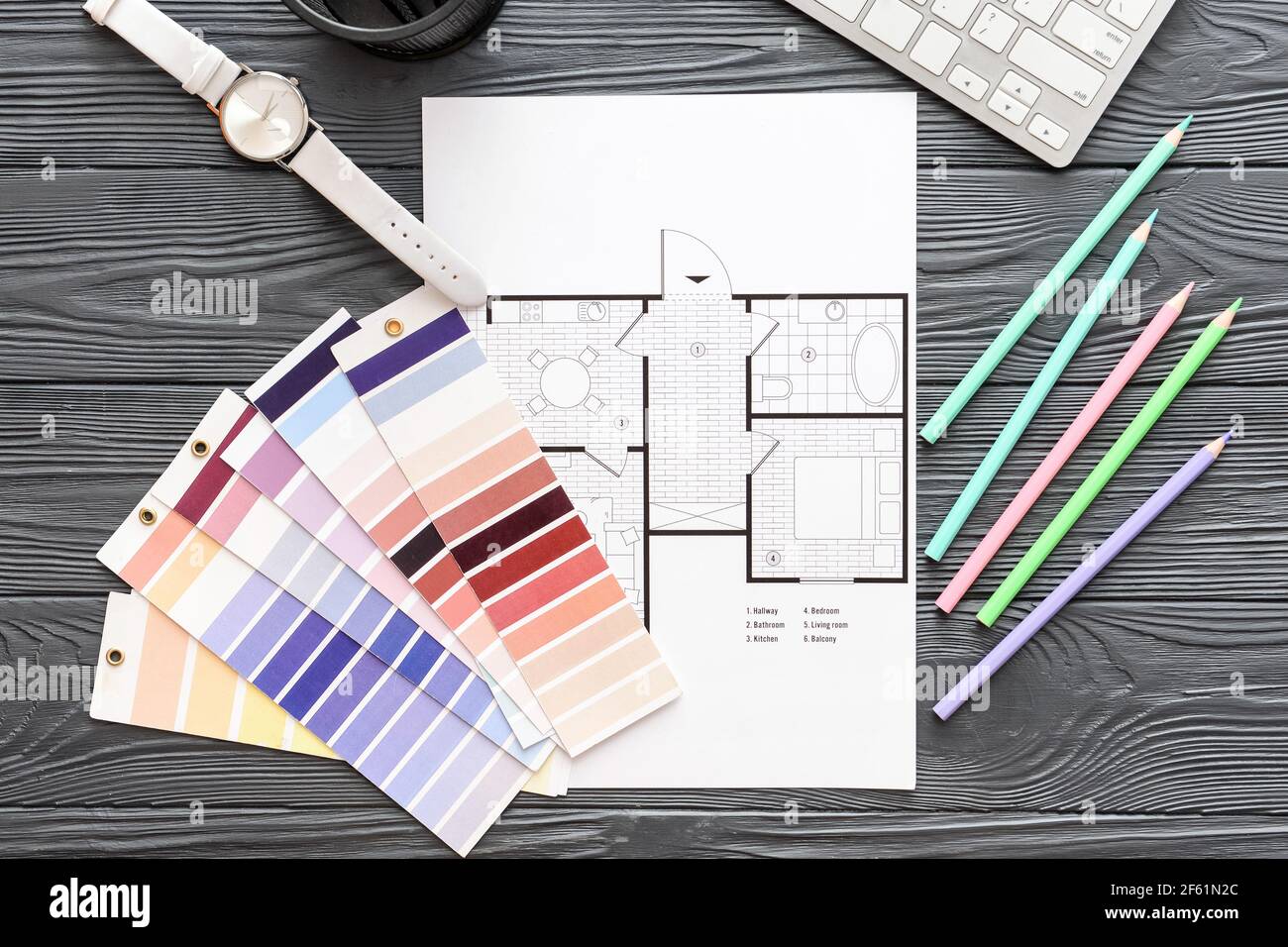 House plan and color palettes on wooden background Stock Photo - Alamy
