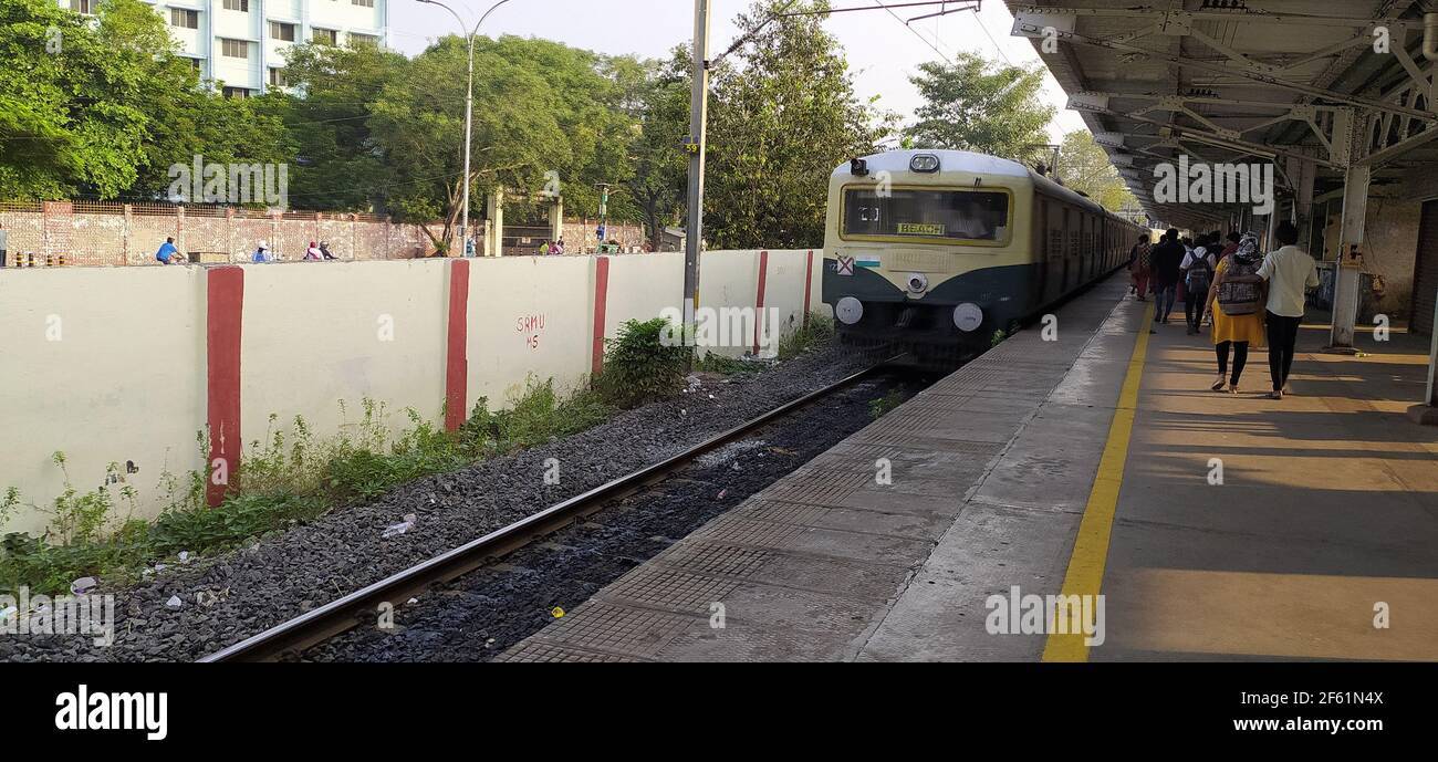 Suburban local train on the fort railway station. City metro vendors ...