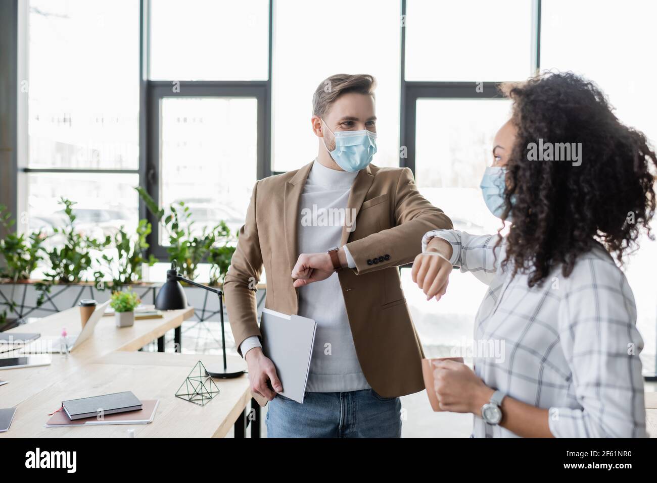 Elbow greeting hi-res stock photography and images - Alamy