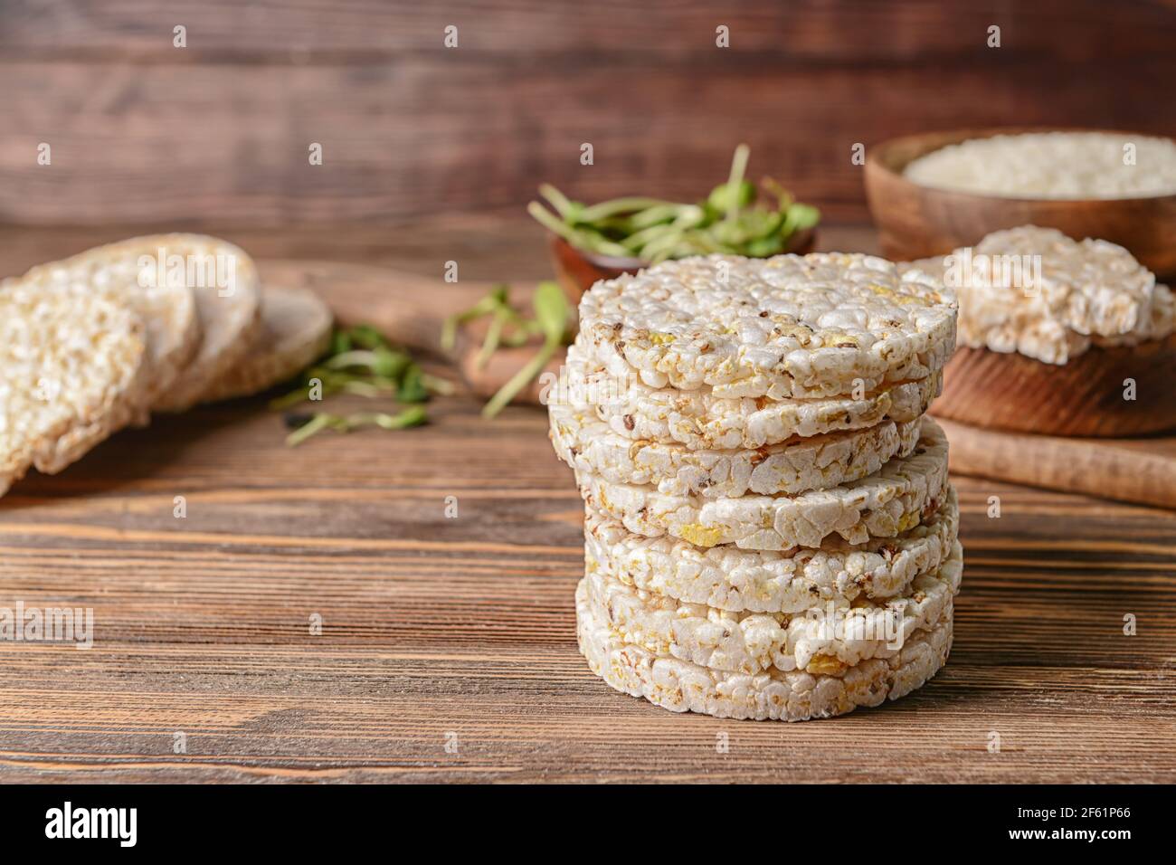 Stack of rice crackers on wooden background Stock Photo - Alamy