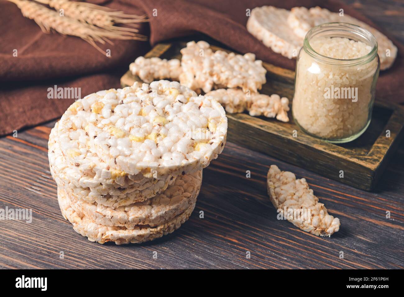 Stack of rice crackers on wooden background Stock Photo - Alamy